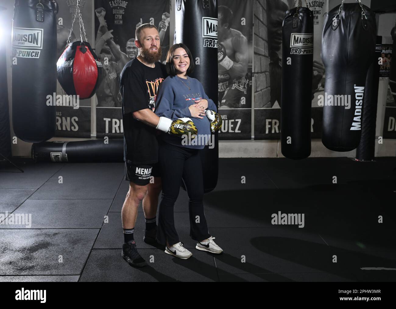 Boxer Floyd Masson and his partner Hannah who is expecting twins pose ...