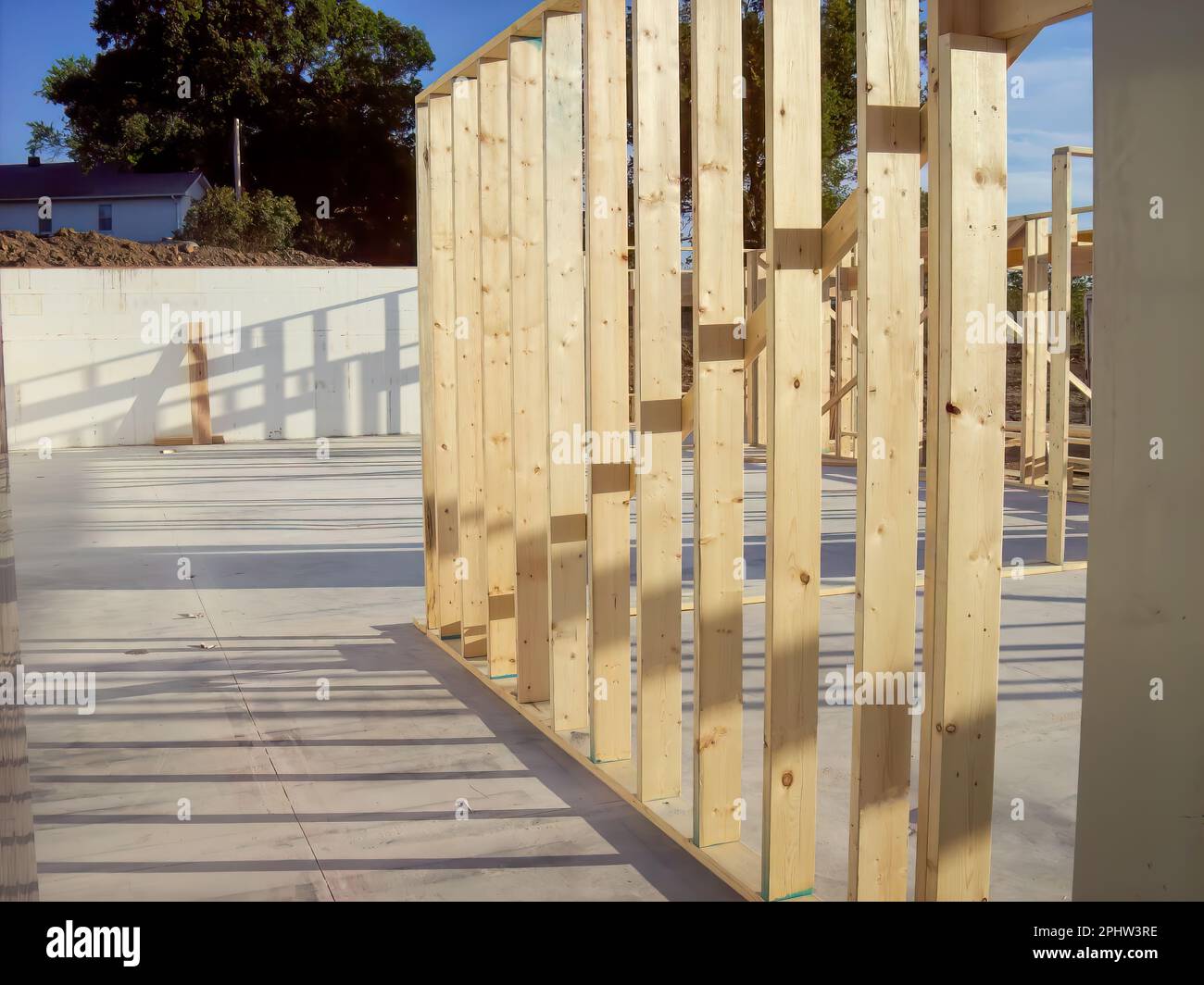 Wall frame being built on a slab-on-grade single story berm home Stock ...