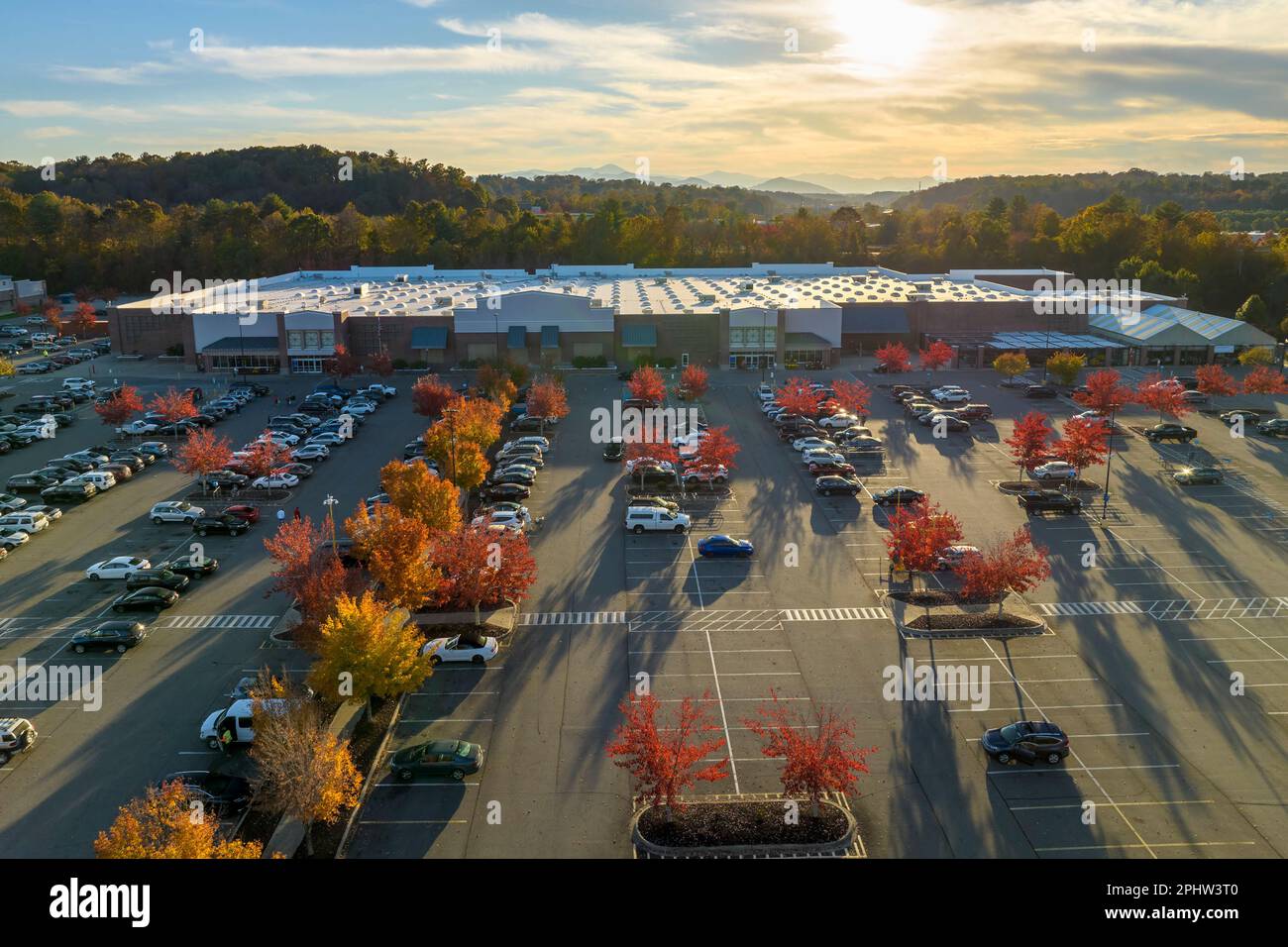 Aerial view grocery shopping mall and many colorful cars parked on ...