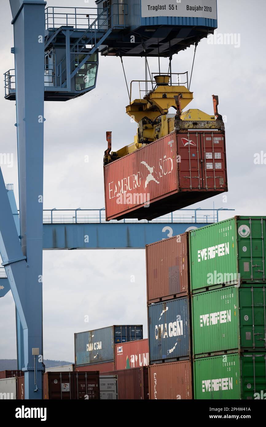 Bad Ems, Germany. 29th Mar, 2023. A crane loads a container in the ...