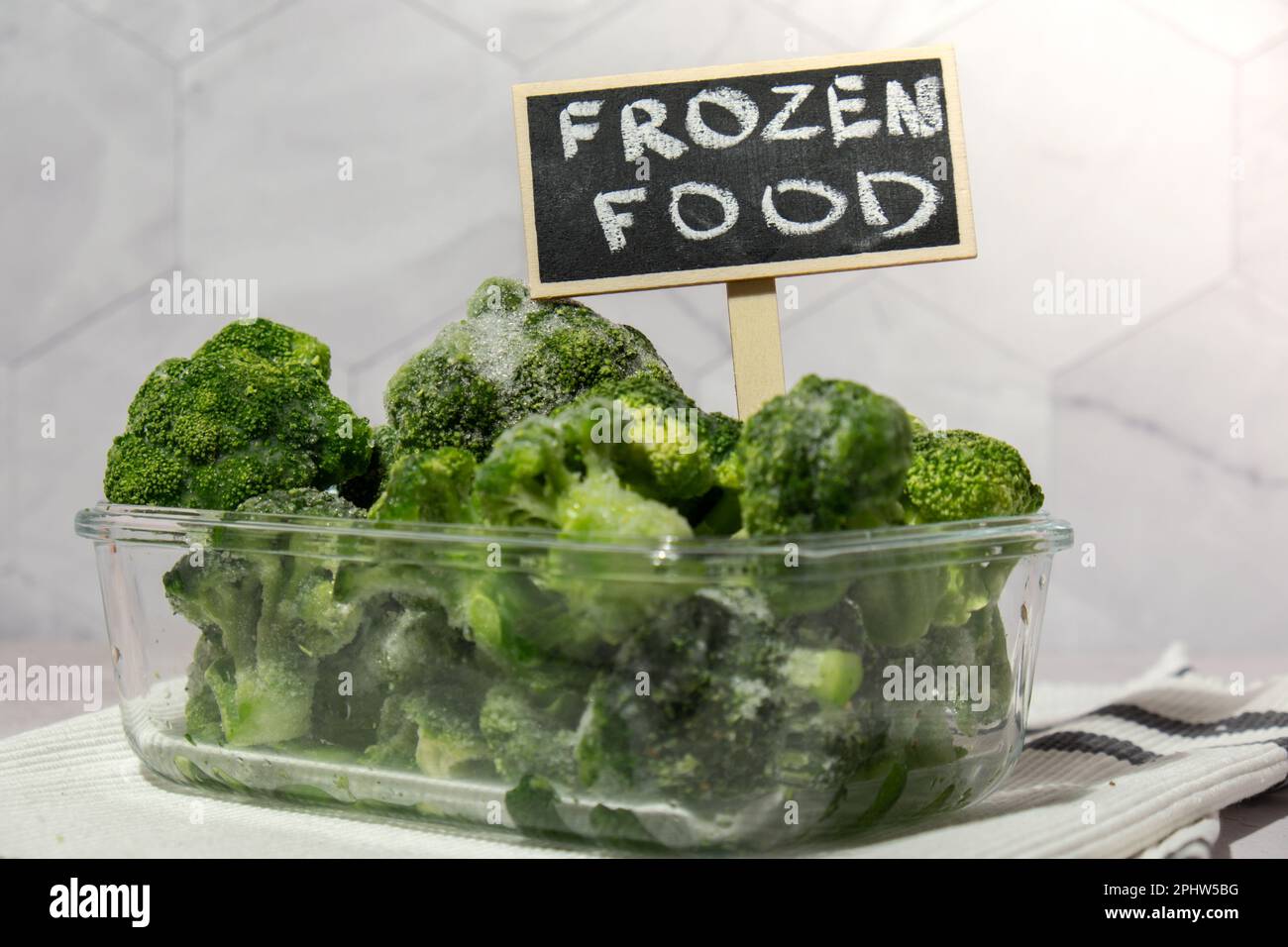 Frozen food broccoli florets with blackboard label and text FROZEN FOOD ...