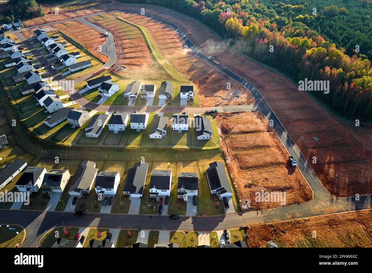 Aerial view of real estate development with tightly located family ...