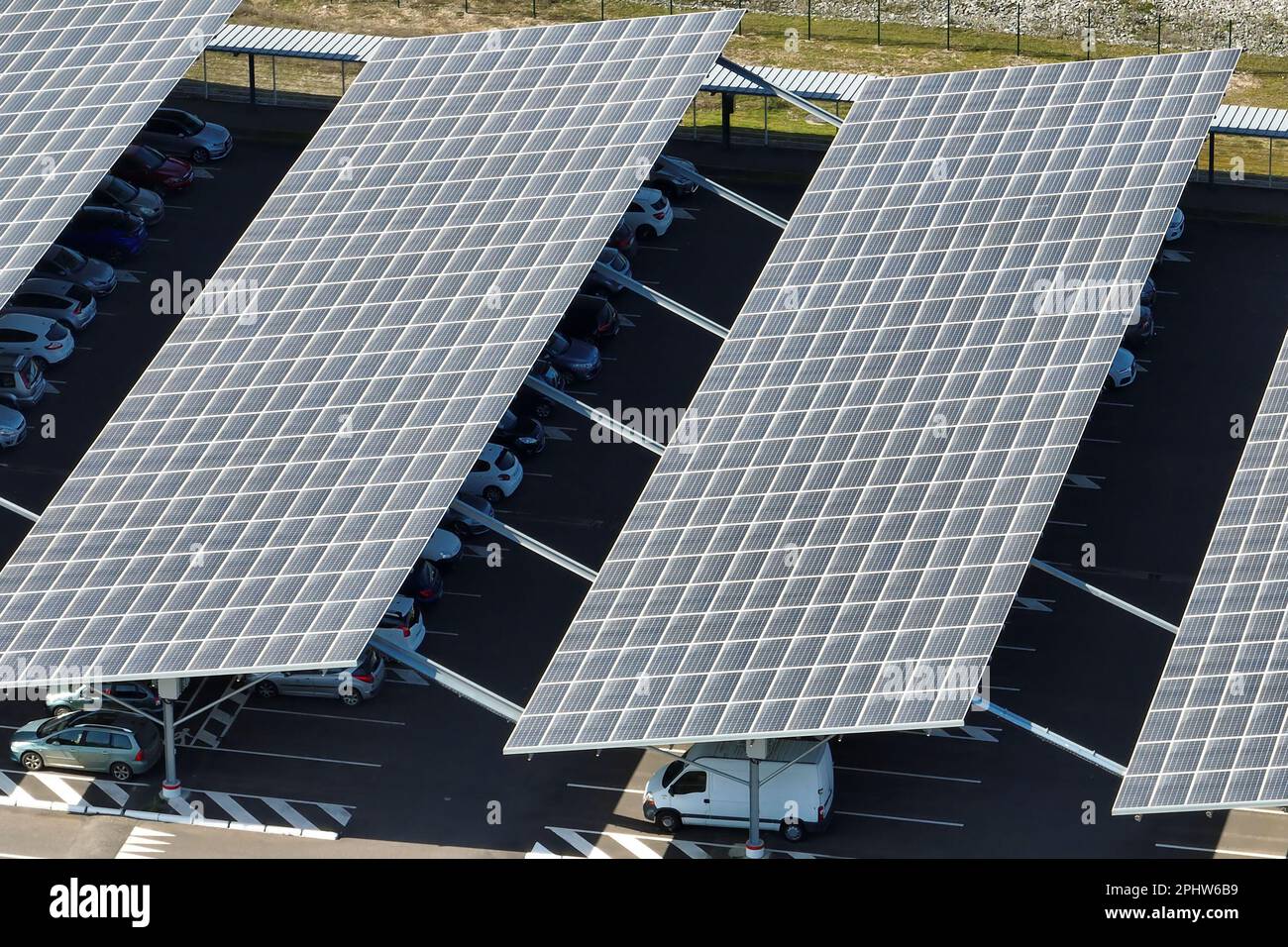 Aerial view of solar panels installed as shade roof over parking lot ...