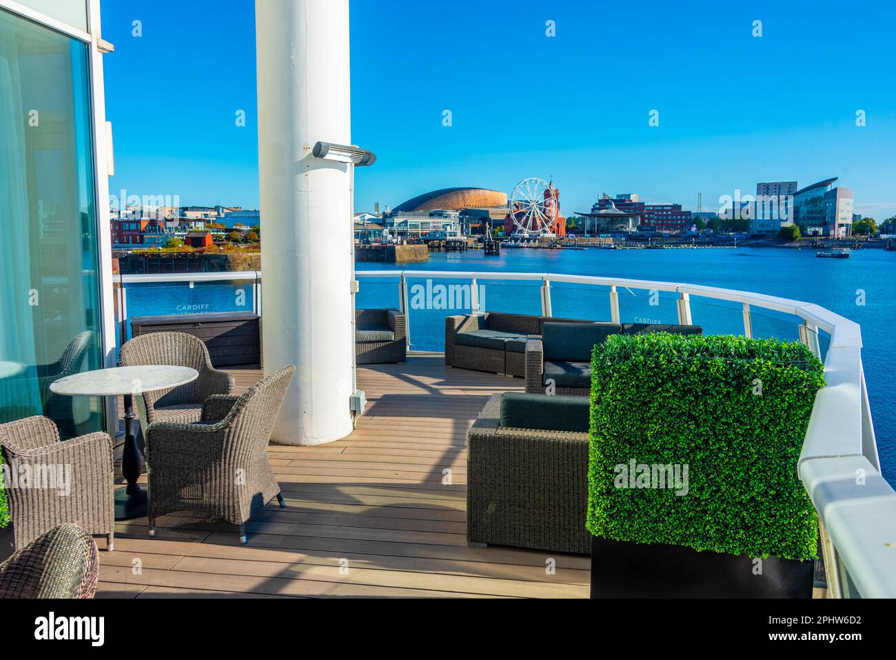 Skyline of Cardiff bay and Mermaid Quay behind a lounge in Wales, UK ...