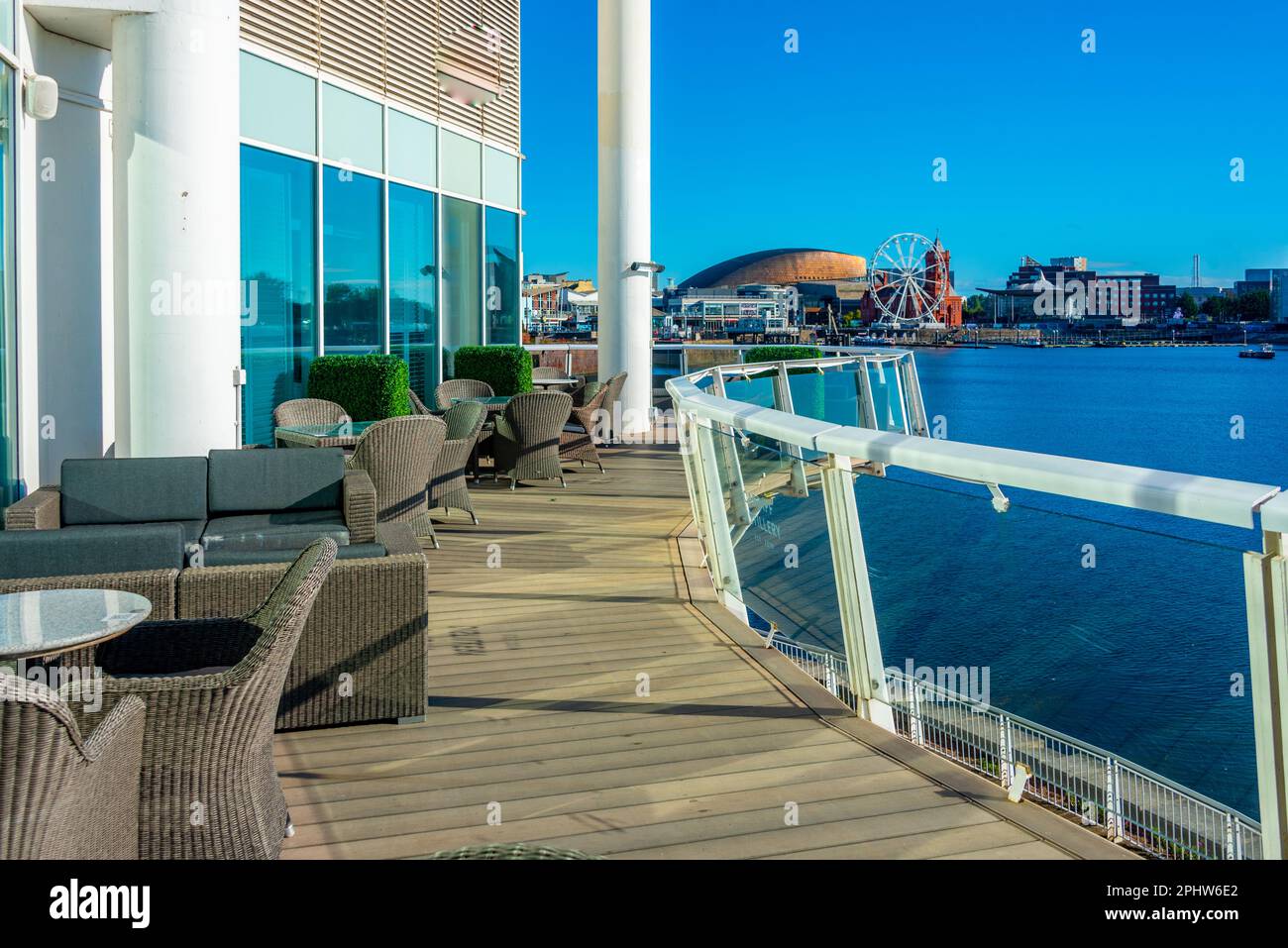 Skyline of Cardiff bay and Mermaid Quay behind a lounge in Wales, UK ...