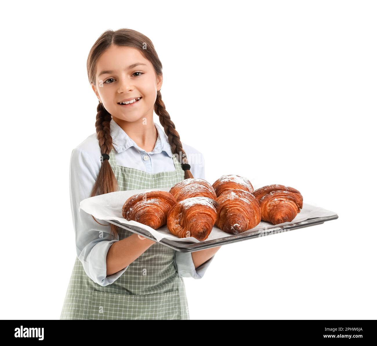 Little baker with tray of tasty croissants on white background Stock ...