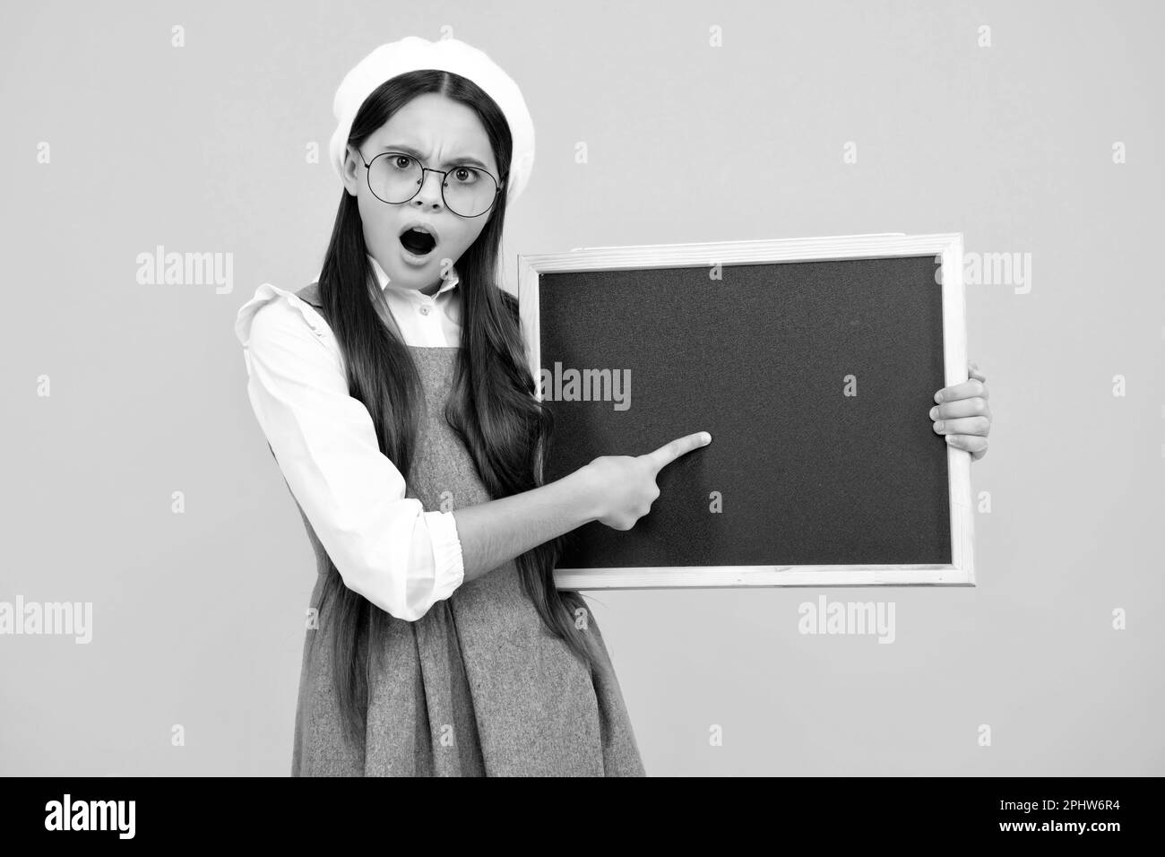 School sales board. Cheerful teenage girl kid hold blackboard ...
