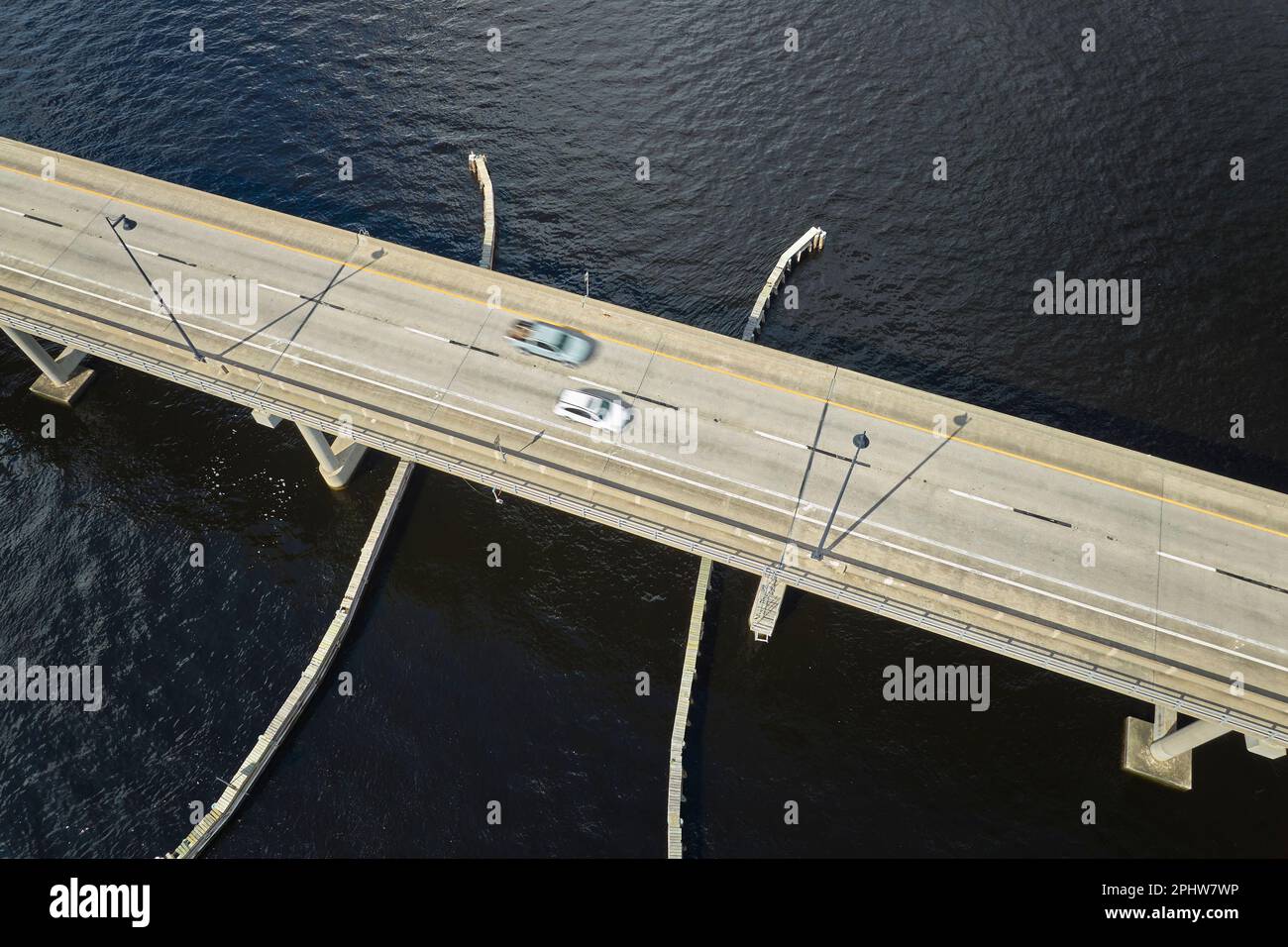 Barron Collier Bridge and Gilchrist Bridge in Florida with moving ...