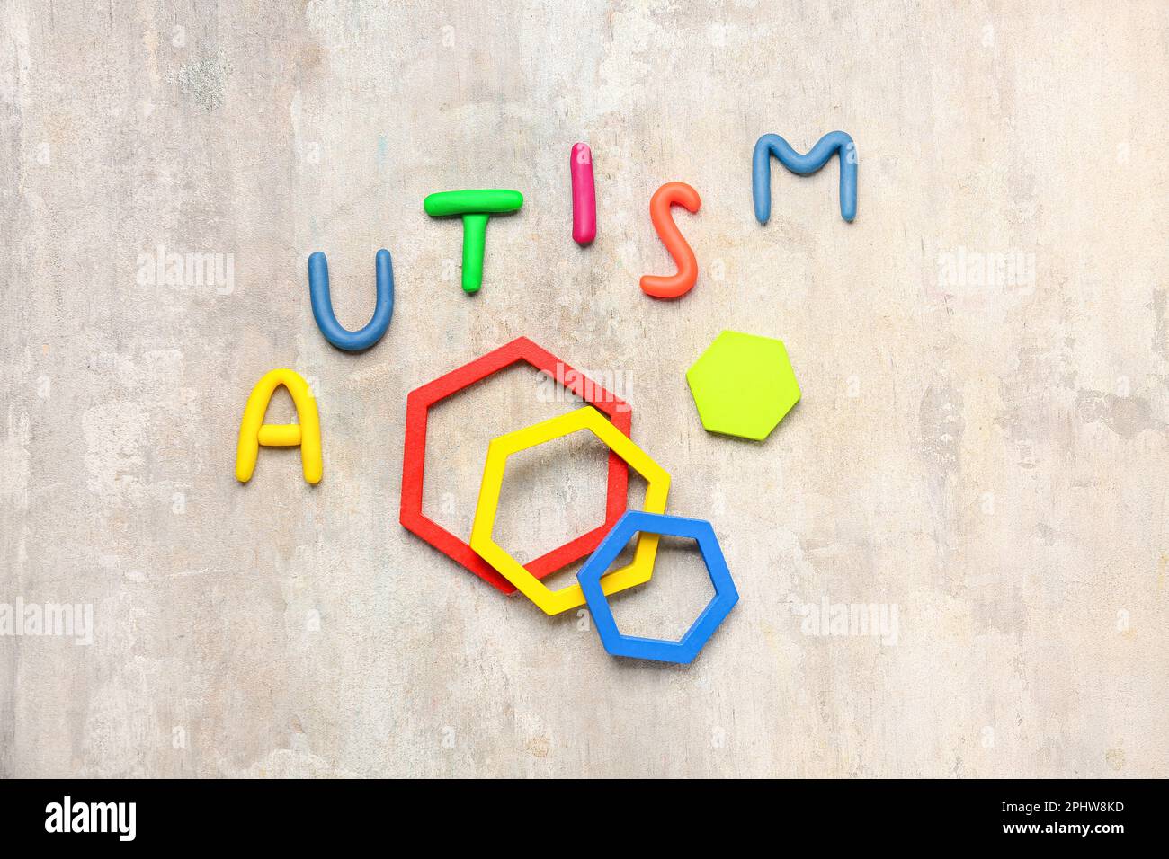 Word AUTISM with blocks on grunge background Stock Photo - Alamy