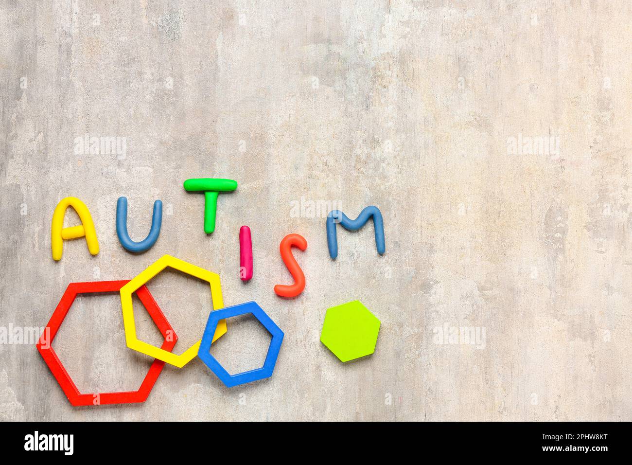 Word AUTISM with blocks on grunge background Stock Photo - Alamy