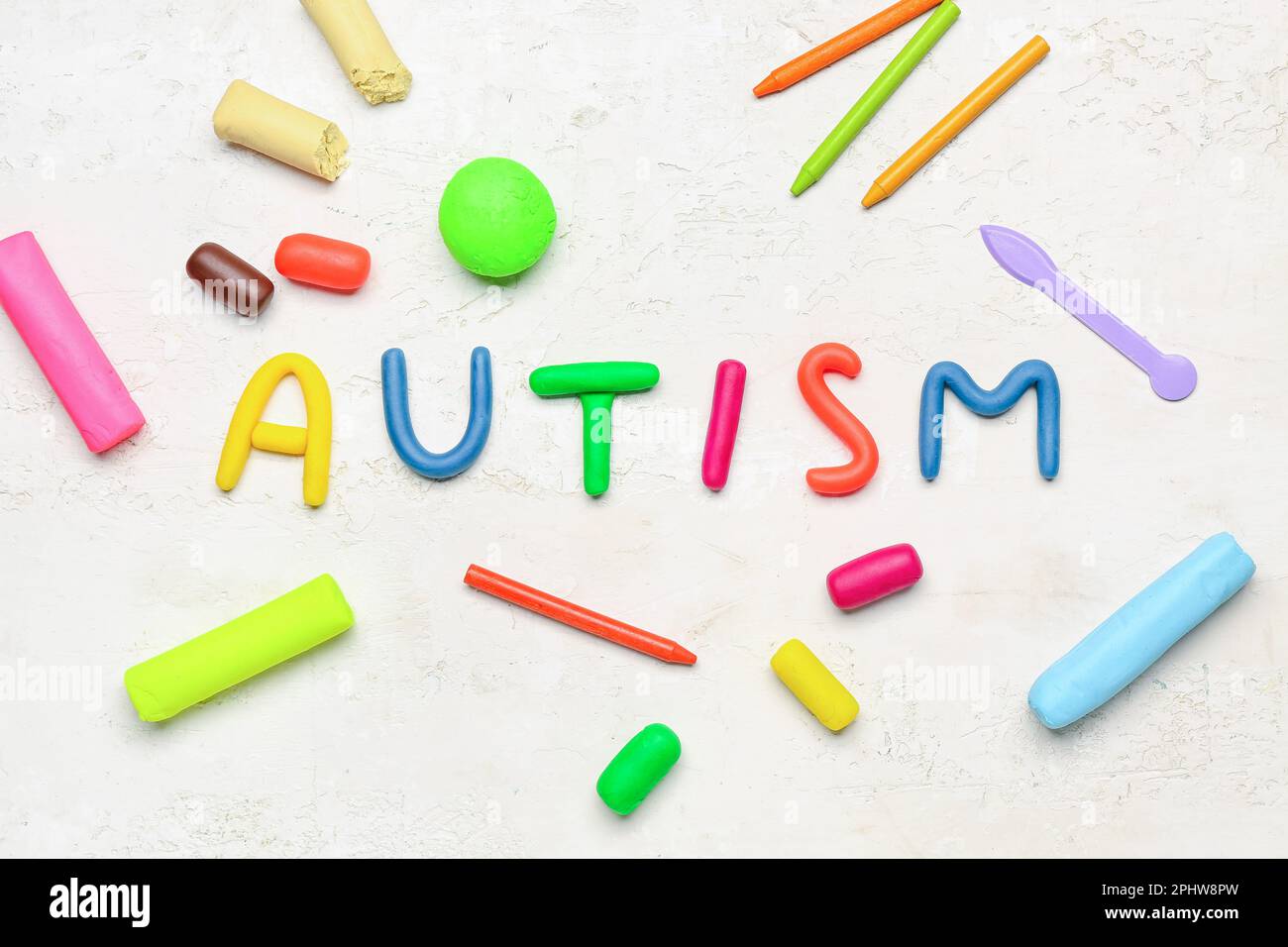 Word AUTISM with plasticine on white background Stock Photo - Alamy
