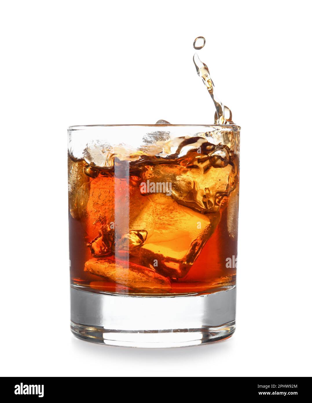 Glass of cold rum with splashes on white background Stock Photo - Alamy