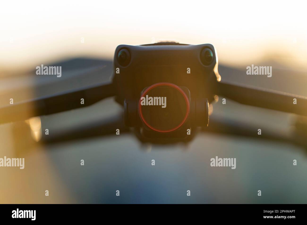 Drone aircraft with blurred fast rotating propellers and video camera ...
