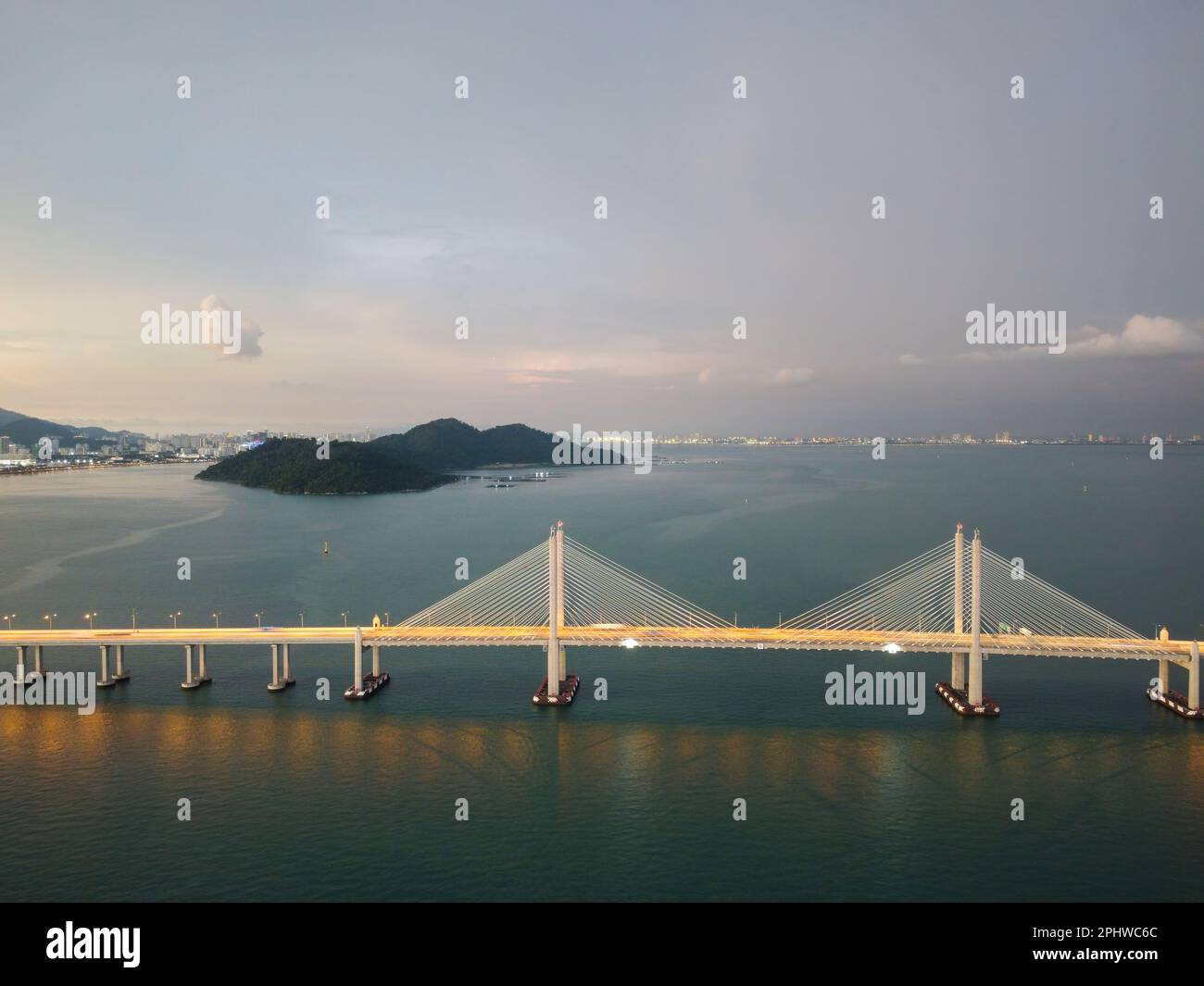 Drone shot of lighting at the Penang Second Bridge during blue hour ...