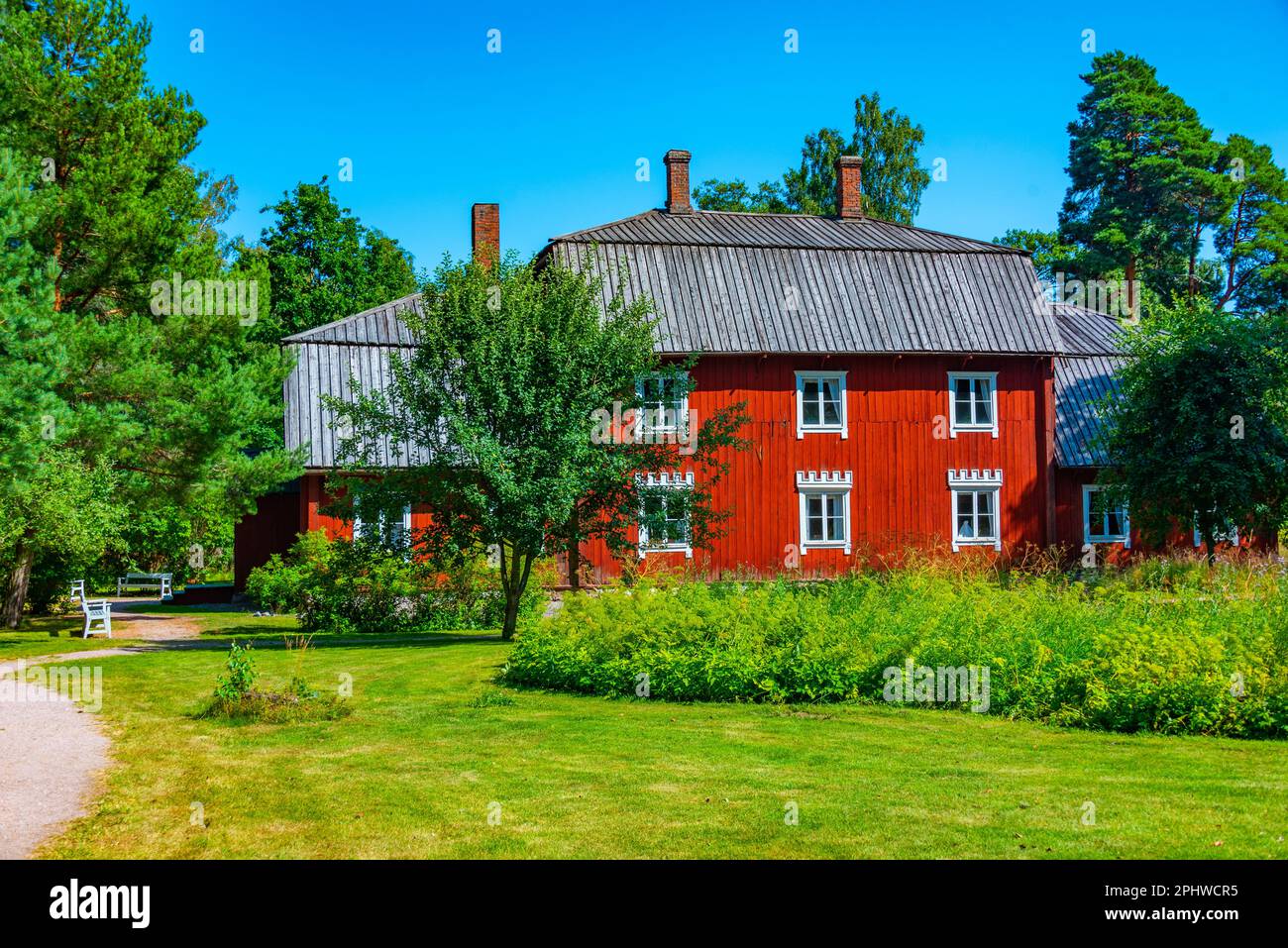Wooden buildings at Seurasaari Open-Air Museum in Helsinki, Finland ...