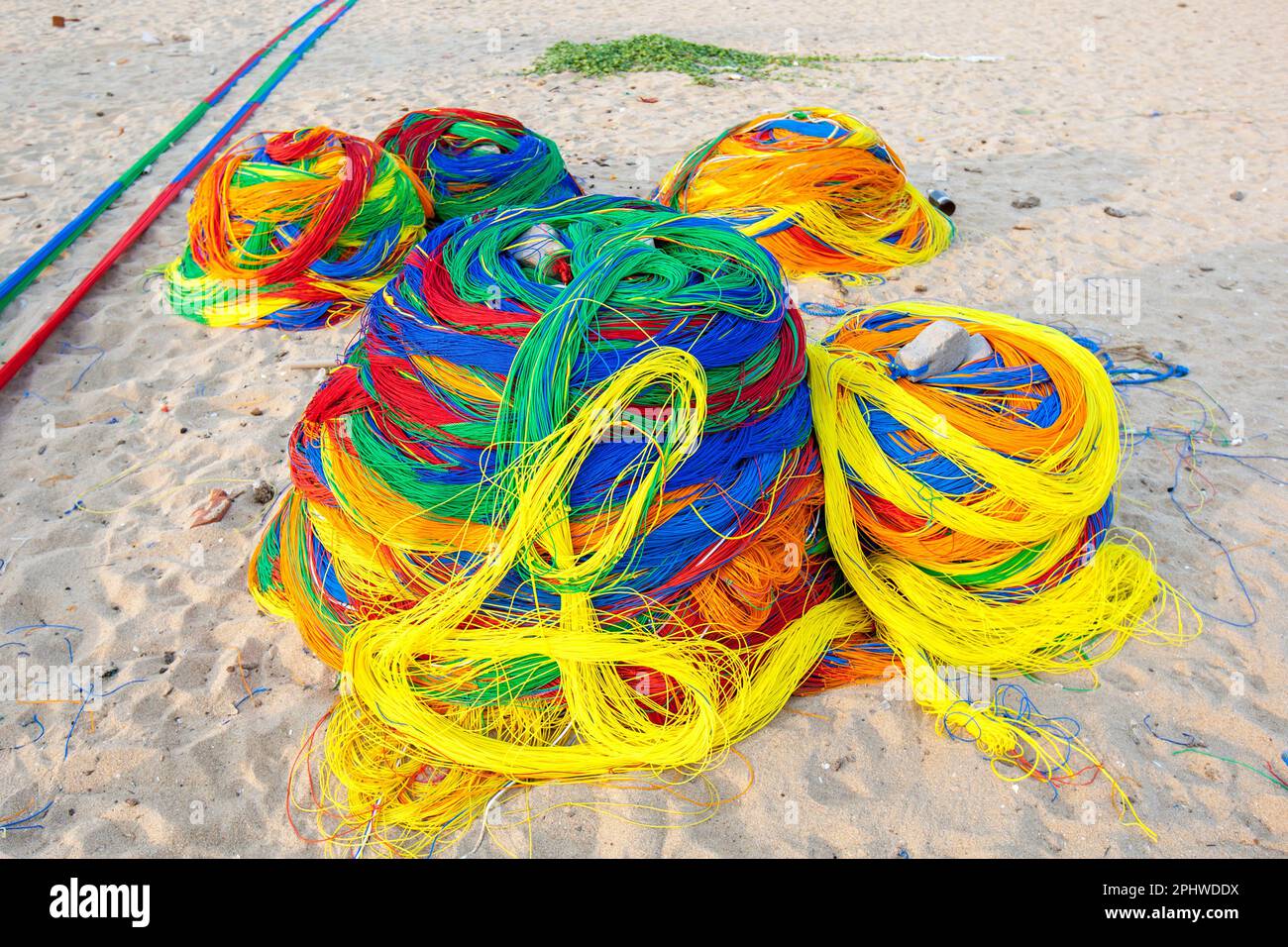 Colourful line used by Seine fishermen sits on Pottuvil beach on the ...