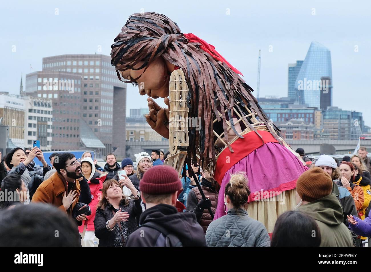 London, UK. 29th March, 2023. Little Amal, a 12-foot puppet of a Syrian ...