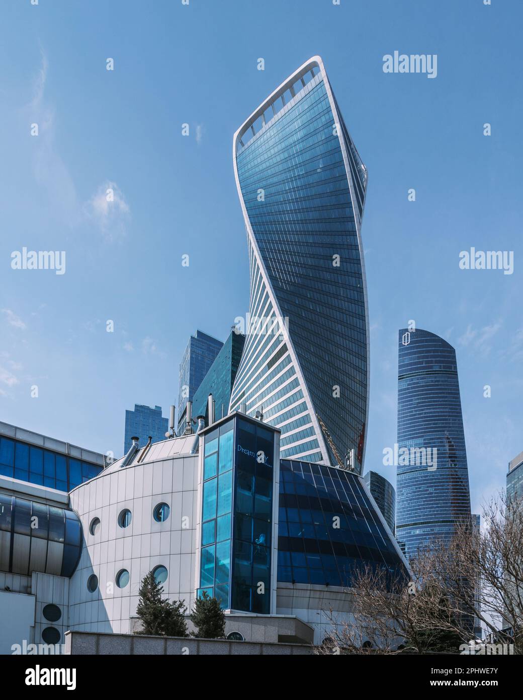 Evolution Tower in business district Moscow City on blue sky background ...