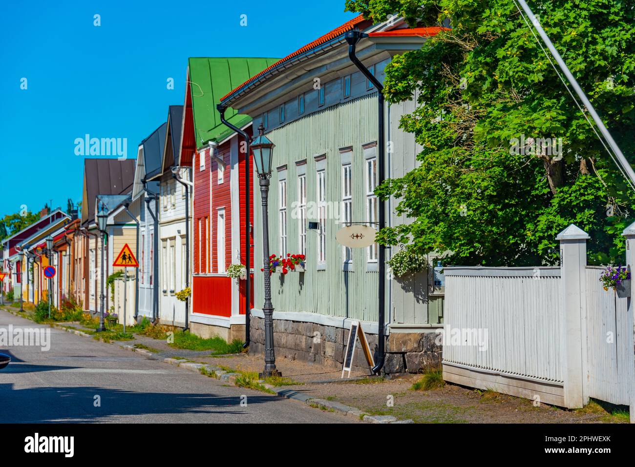 Colorful timber houses in Neristan district of Finnish town Kokkola ...