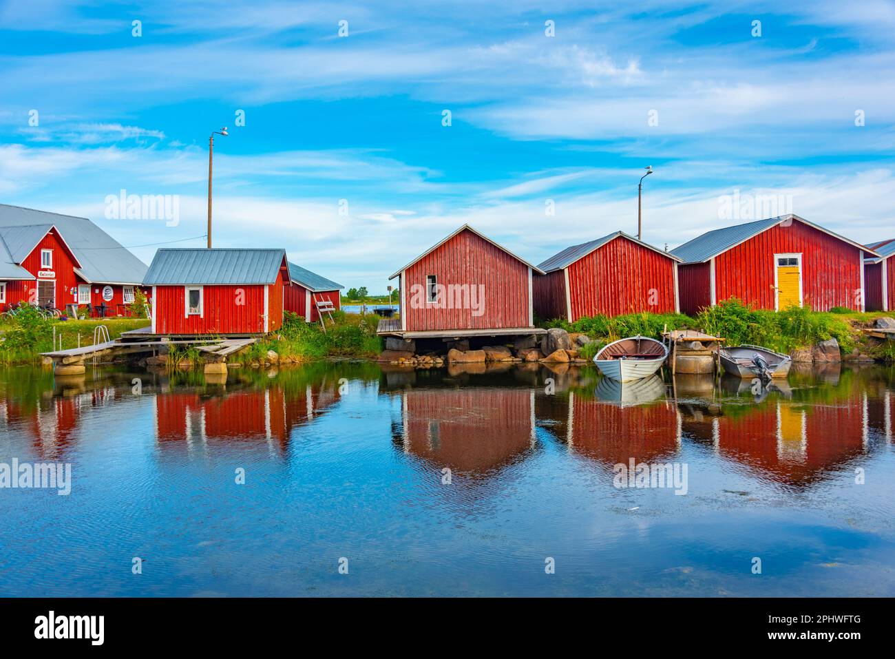 Red timber boat houses at Svedjehamn in Finland Stock Photo - Alamy