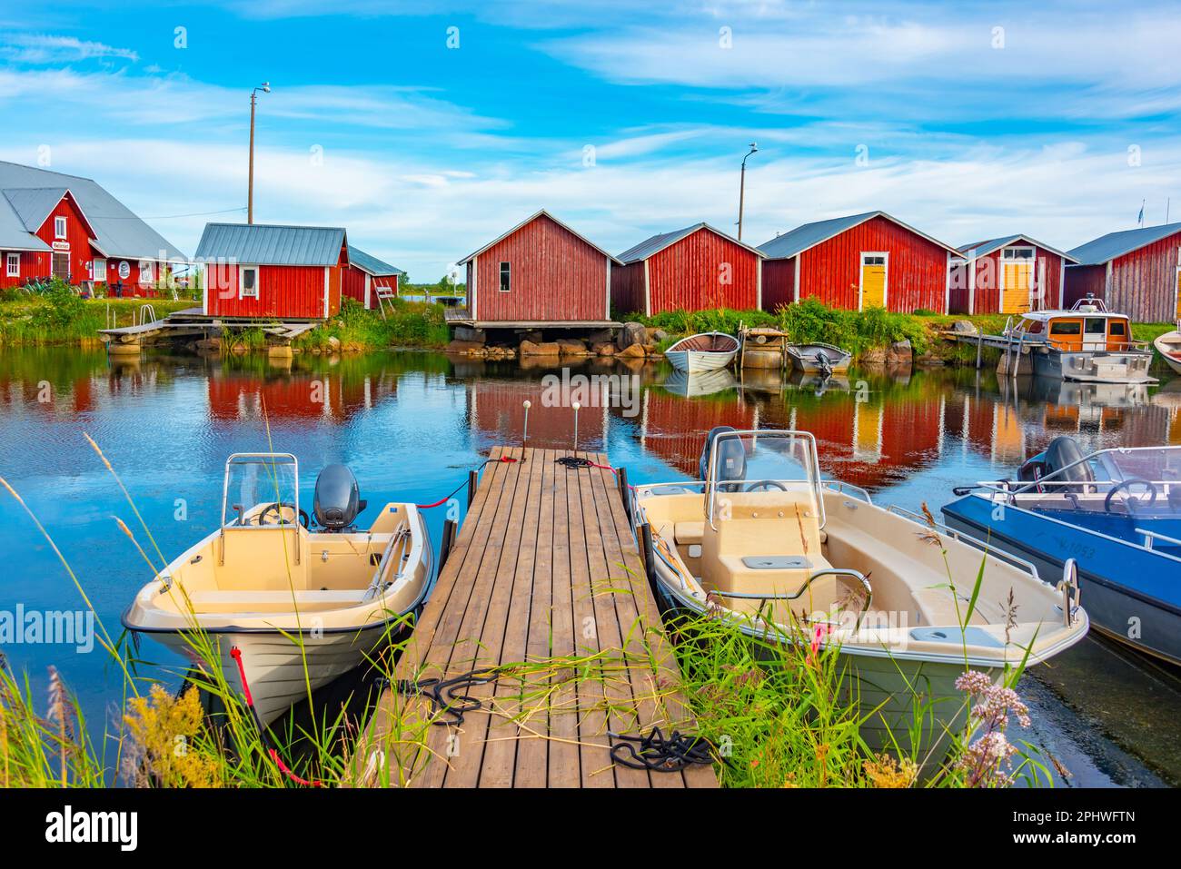 Red timber boat houses at Svedjehamn in Finland Stock Photo - Alamy