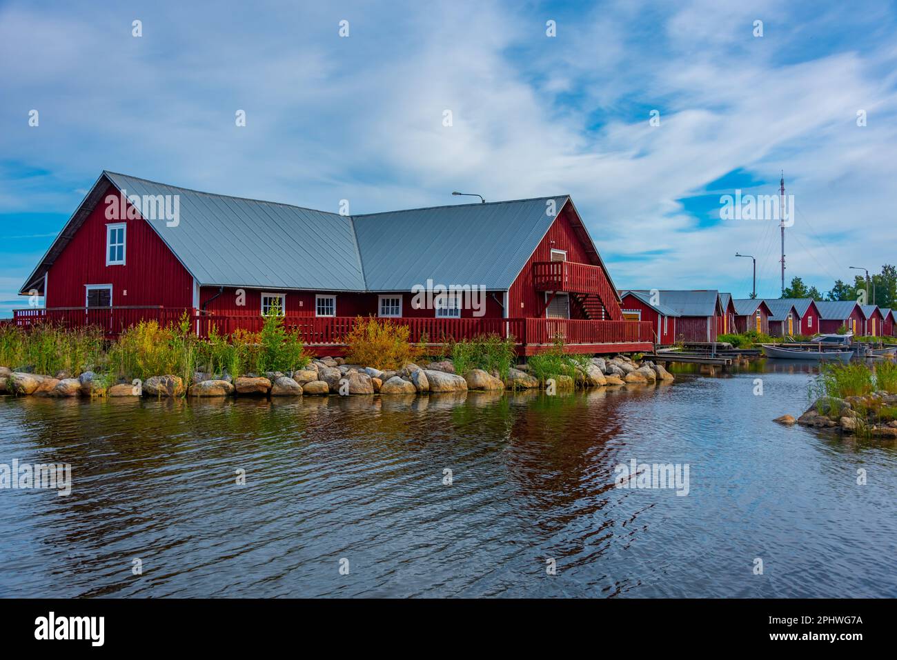 Red timber boat houses at Svedjehamn in Finland Stock Photo - Alamy