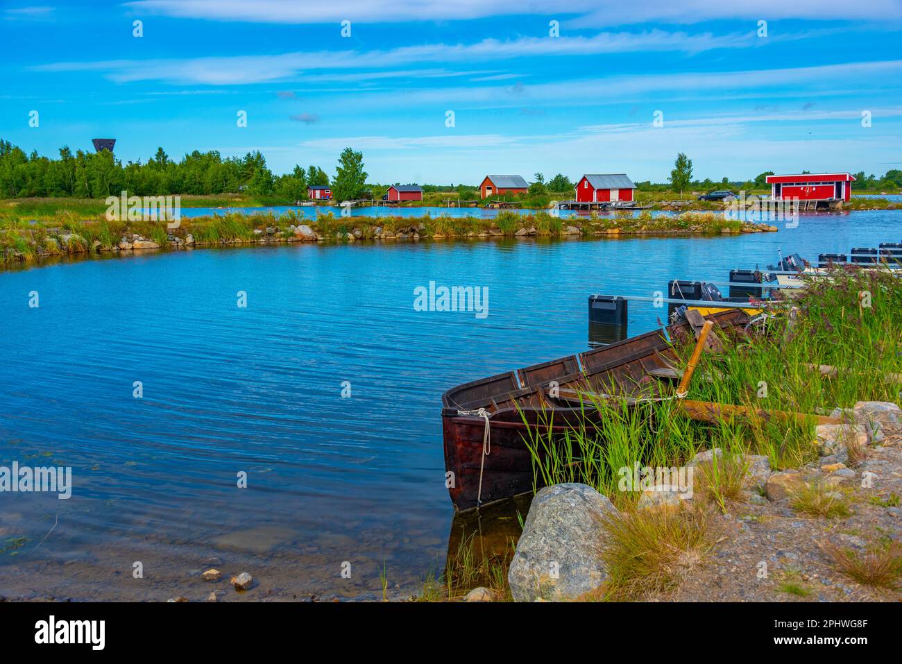 Red timber boat houses at Svedjehamn in Finland Stock Photo - Alamy