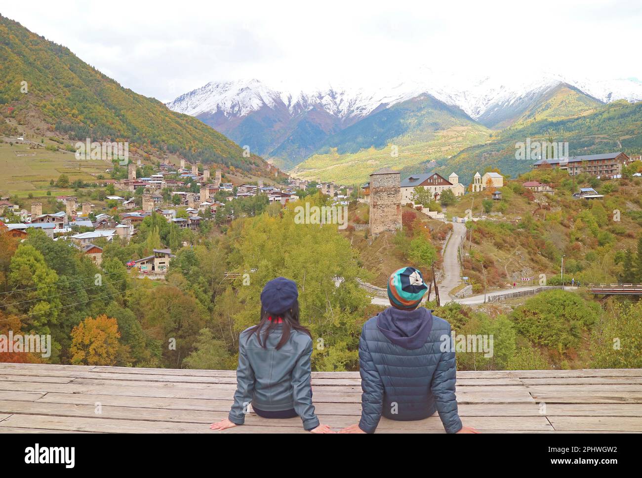Couple Relaxing at the Viewing Deck of Mestia Town with the Amazing ...