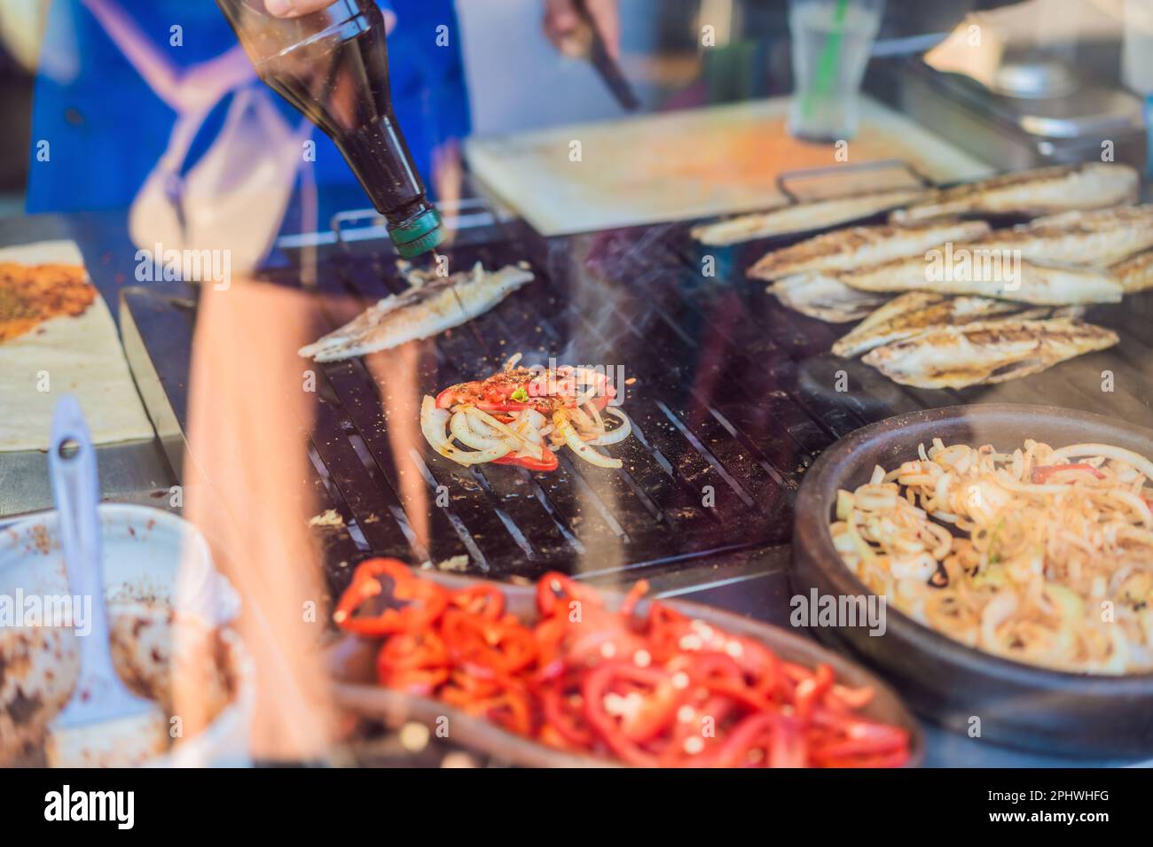 Balik ekmek - fish in a bread, traditional Turkish fast food. Istanbul ...