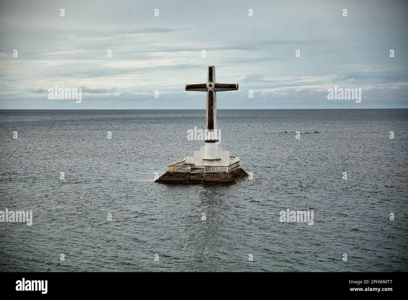 The cross of the Sunken Cemetery of Camiguin in the Philippines which ...