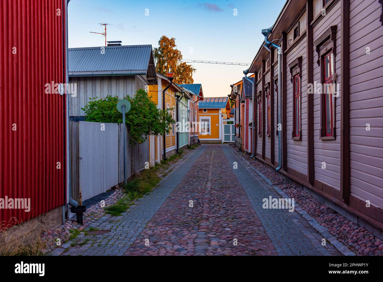 Sunset view of timber buildings at Vanha Rauma district of Rauma in ...