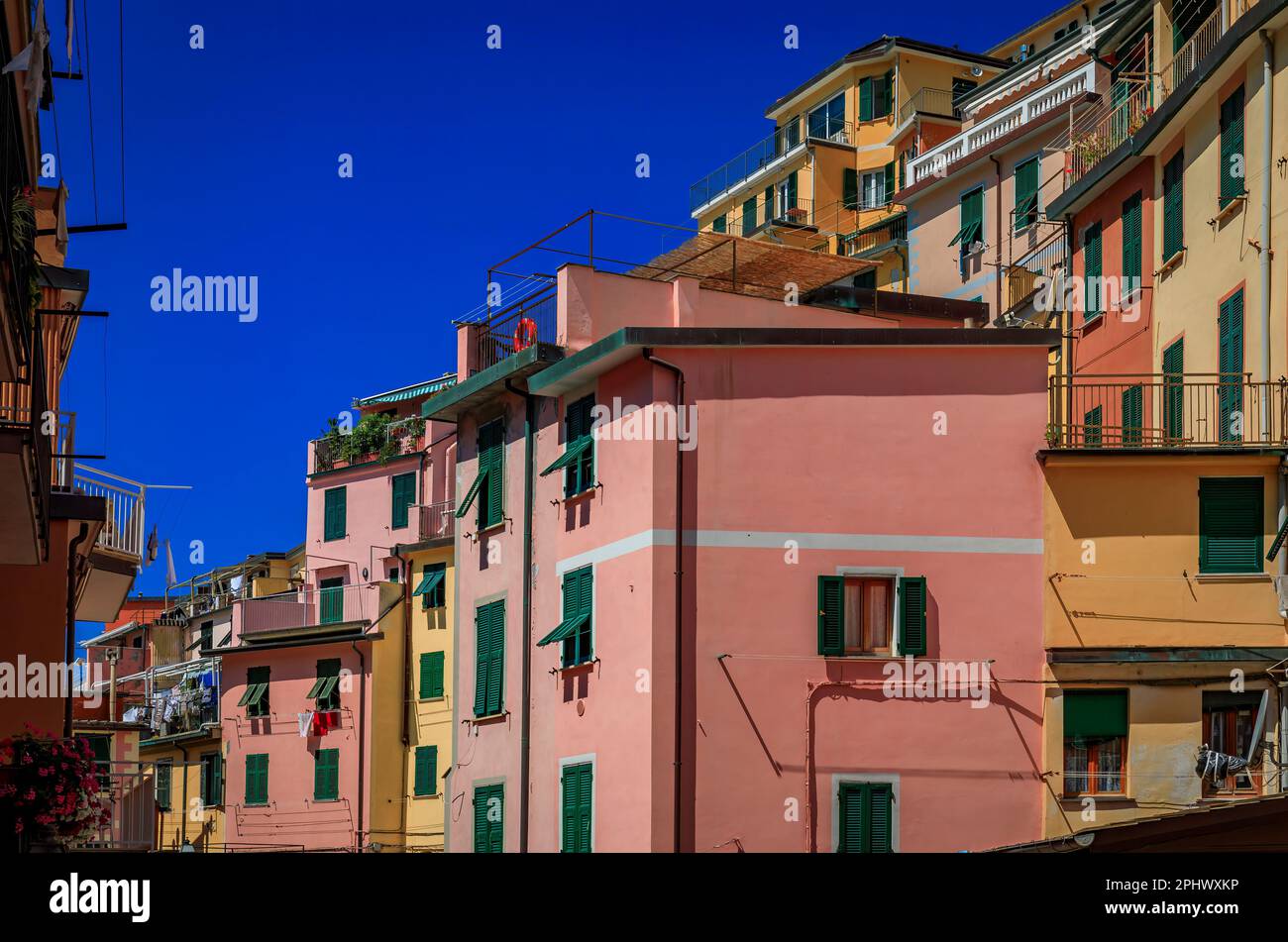 Traditional colorful houses on a hillside street in old town of ...