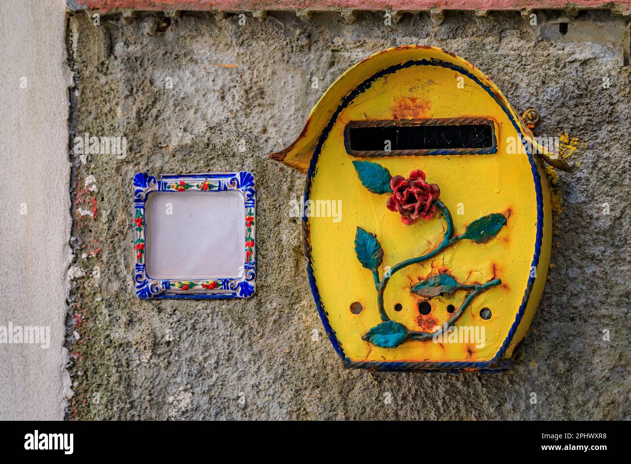 Traditional ornate and colorful antique mailbox in a street in the old ...