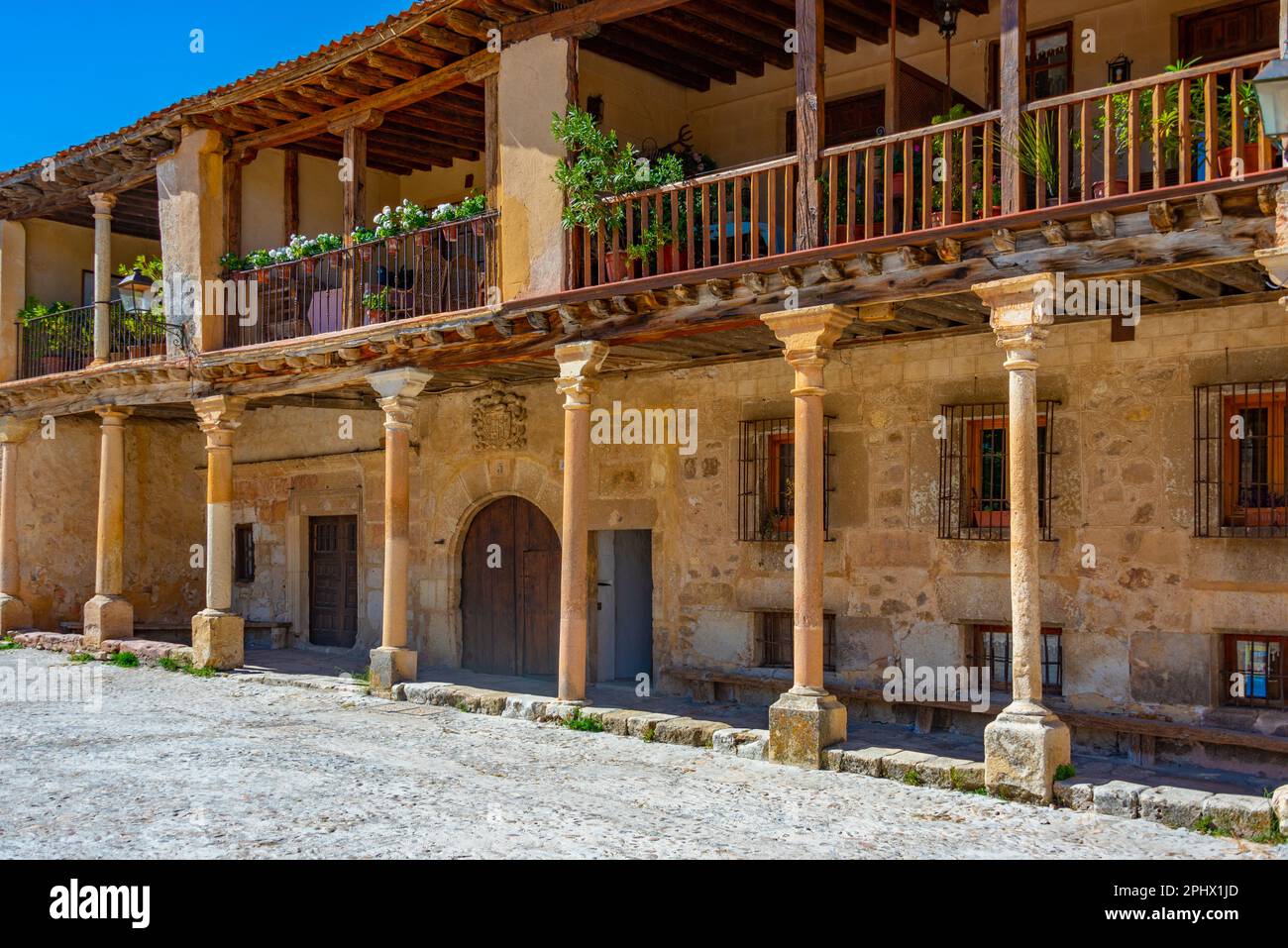 Narrow street in medieval village Pedraza in Spain Stock Photo - Alamy