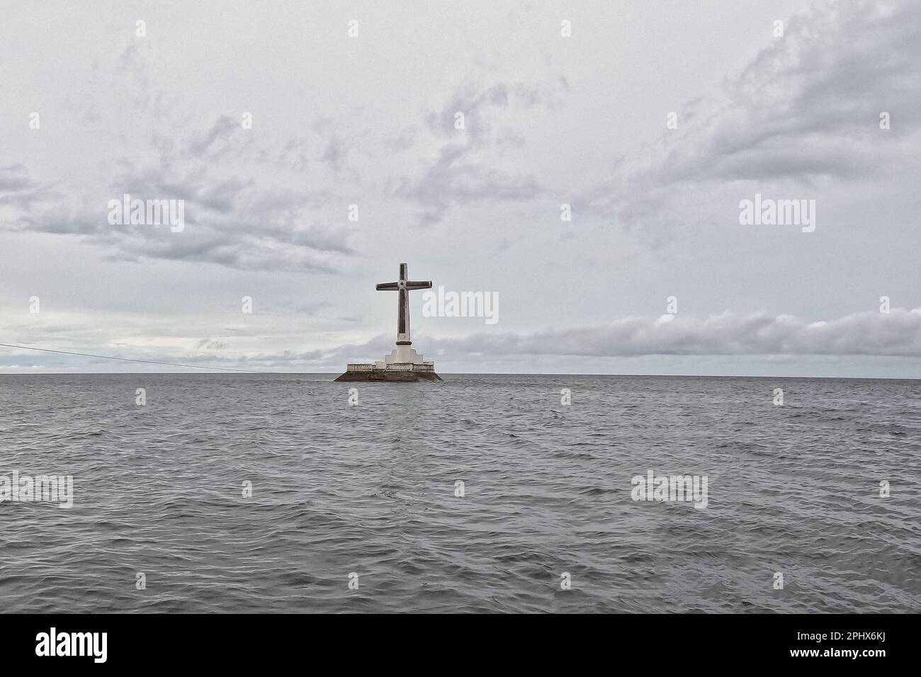 The cross of the Sunken Cemetery of Camiguin in the Philippines which ...