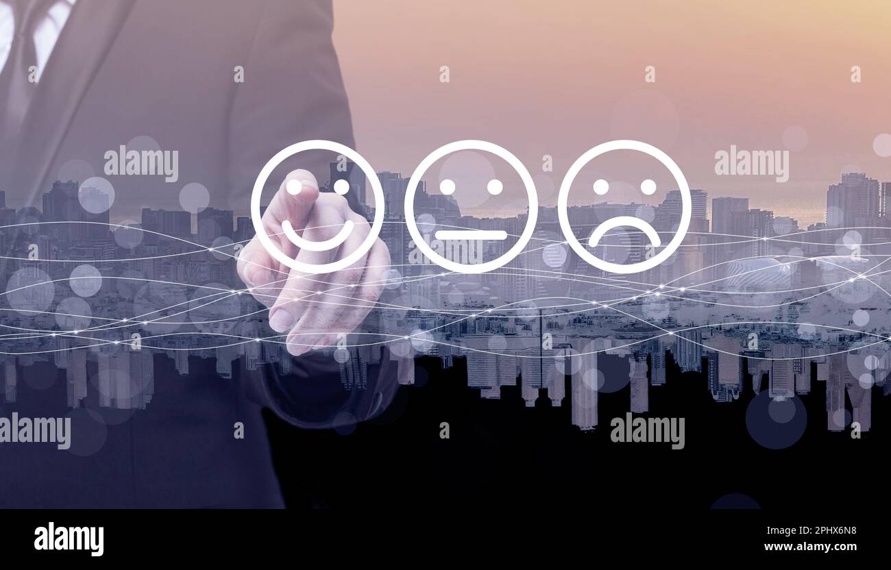 Businessman hand pointing on emoji icons on the background of city ...