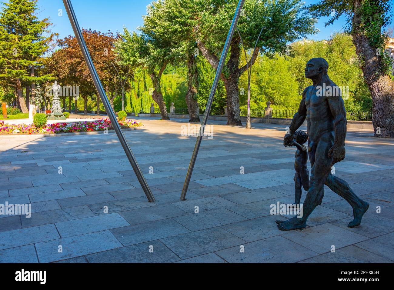 Statue of human evolution in Spanish town Burgos Stock Photo - Alamy