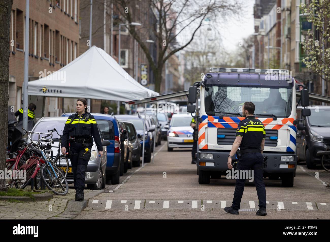 AMSTERDAM - Emergency workers in De Wittenstraat in Amsterdam's ...