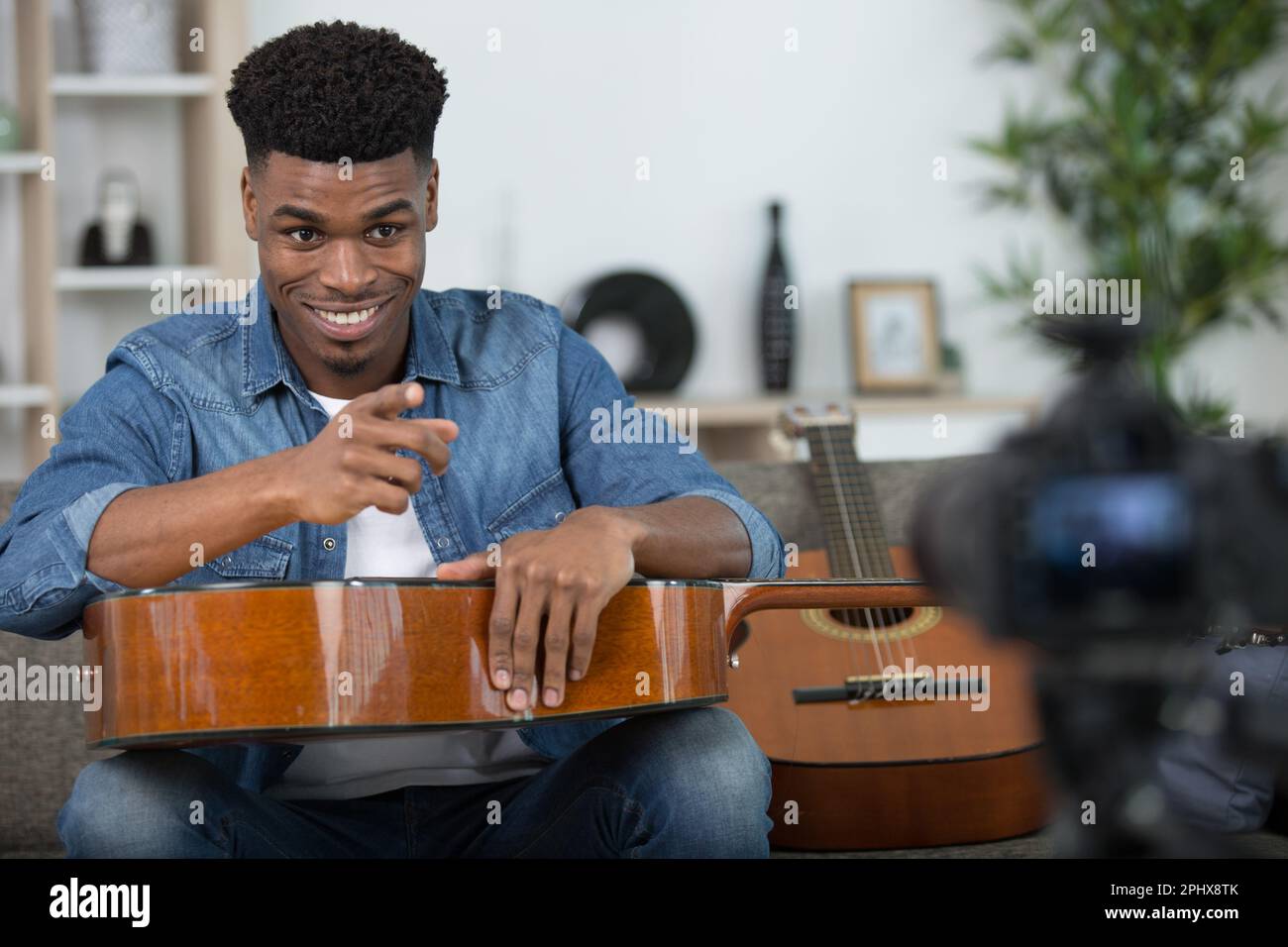 handsome man recording song - vlogging concept Stock Photo - Alamy
