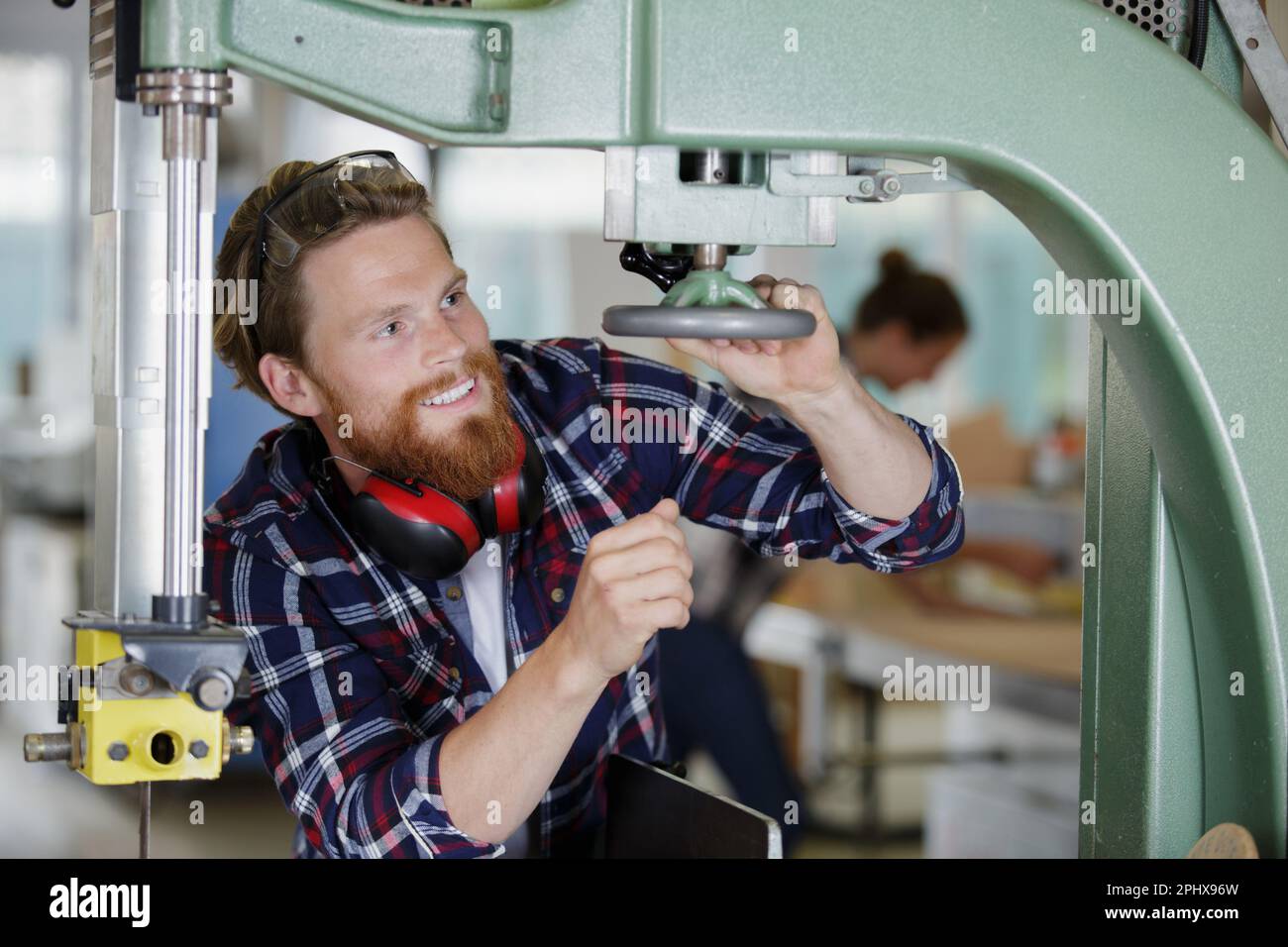 Caucasian worker turning valve hi-res stock photography and images - Alamy