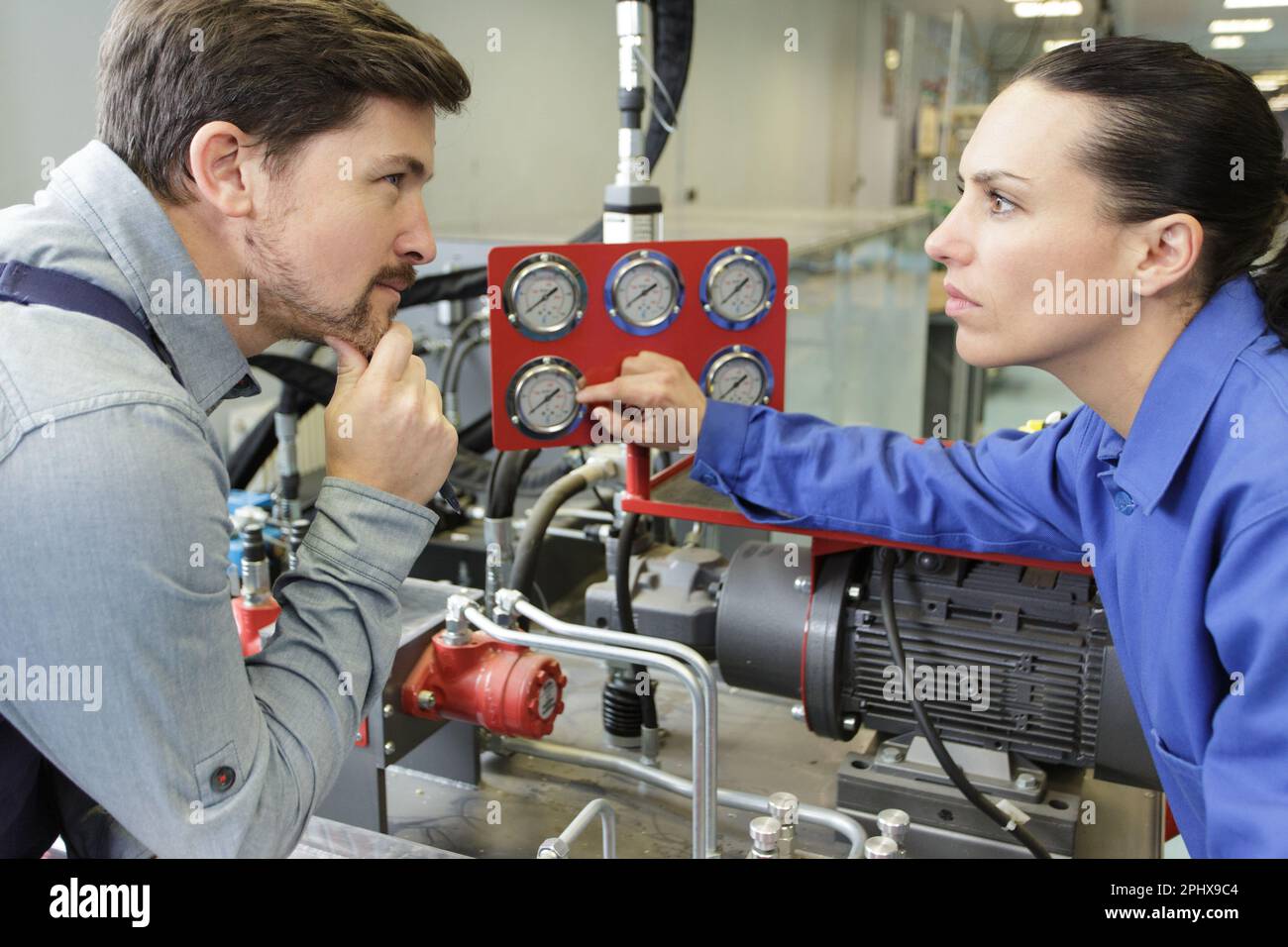 Technician checking gauge hi-res stock photography and images - Alamy