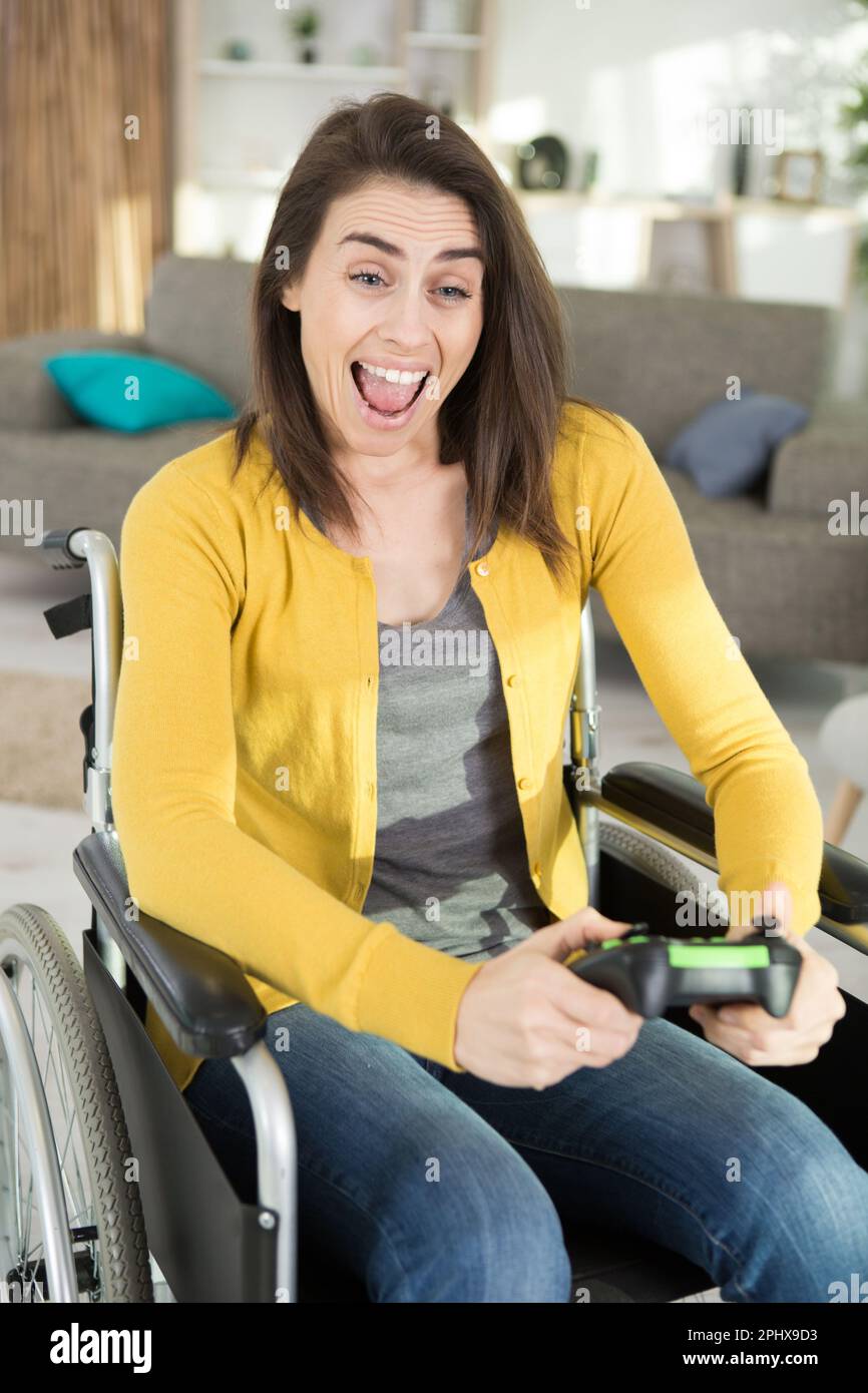 disabled female playing video game Stock Photo - Alamy