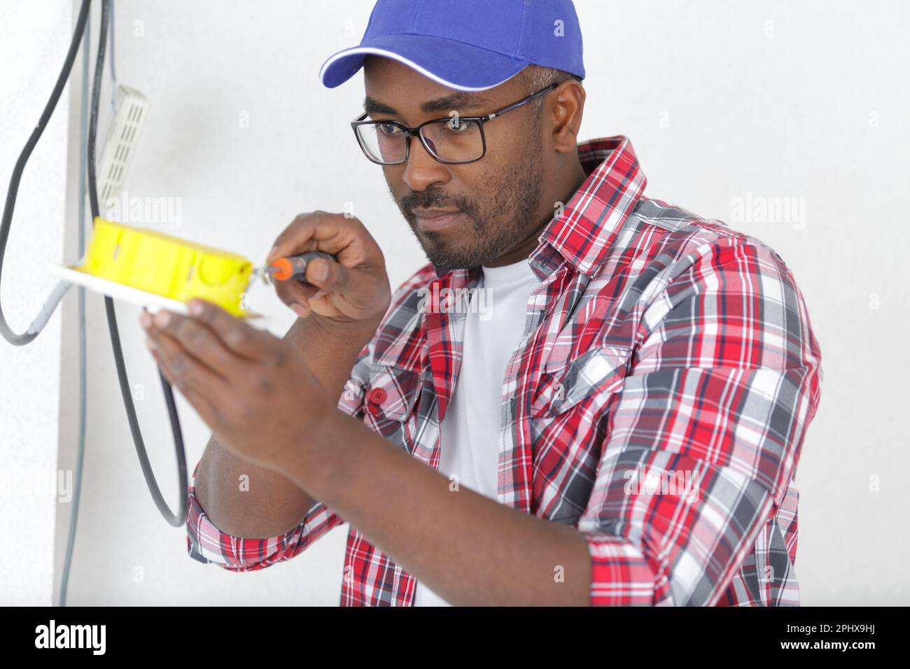 Electrical engineer performs installation hi-res stock photography and ...