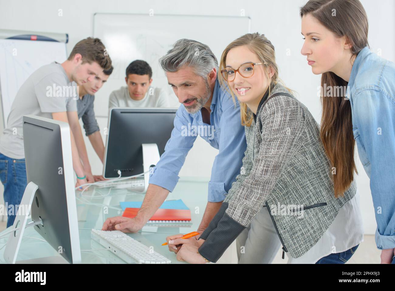 young woman attending computer class Stock Photo - Alamy