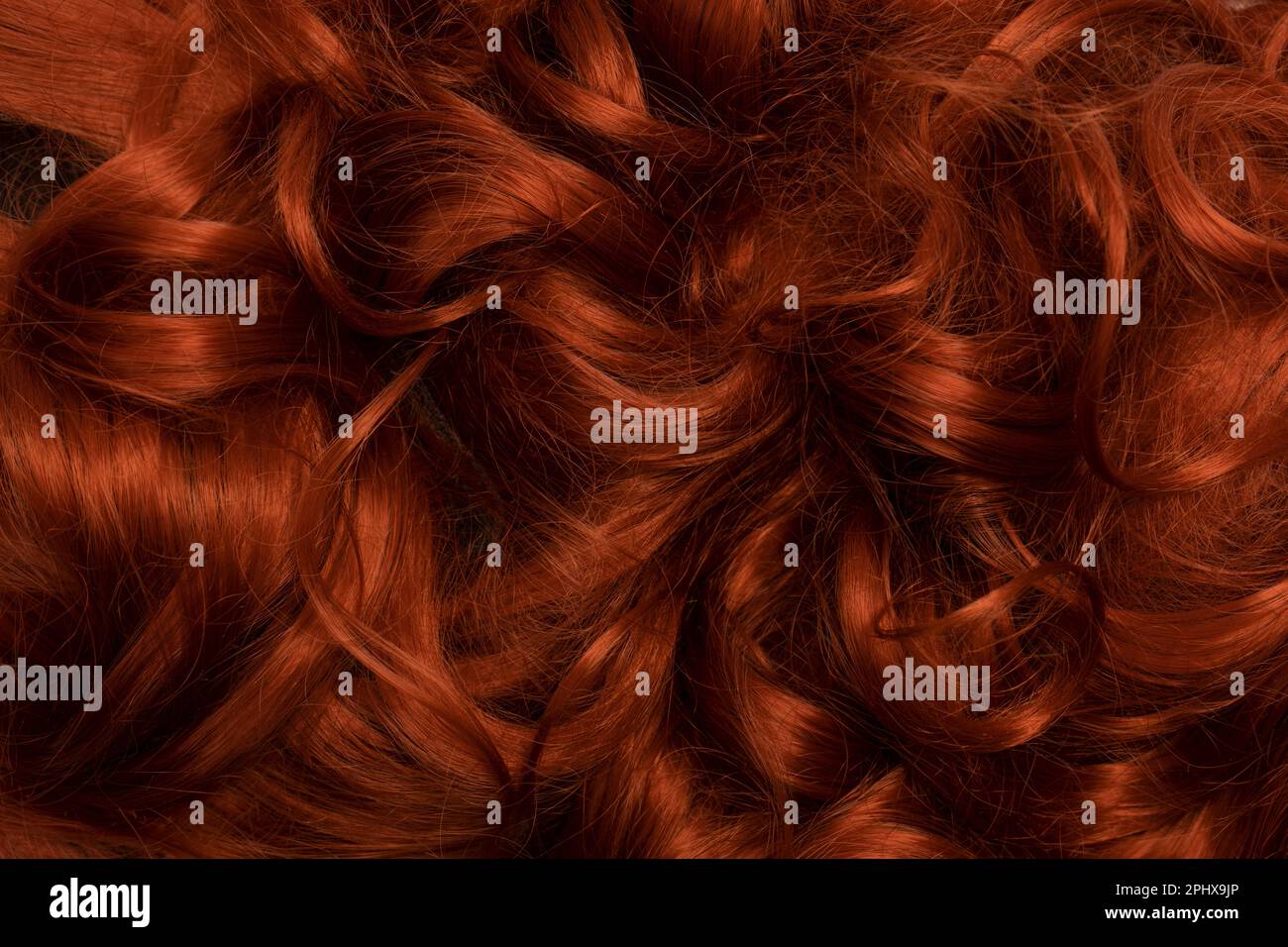 Red hair as a background. Curly red hair Stock Photo - Alamy