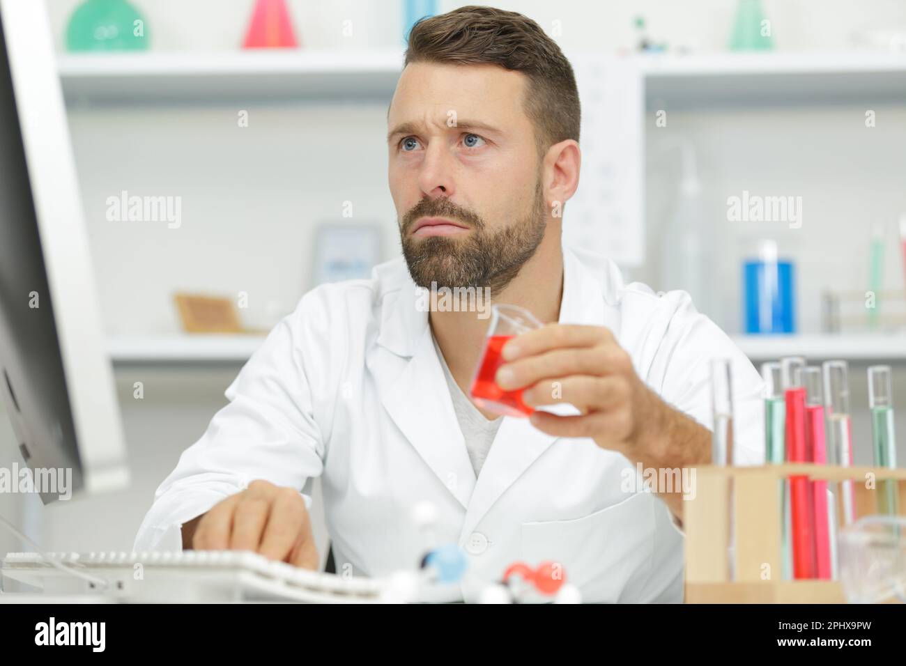 man checking results on pc screen Stock Photo - Alamy