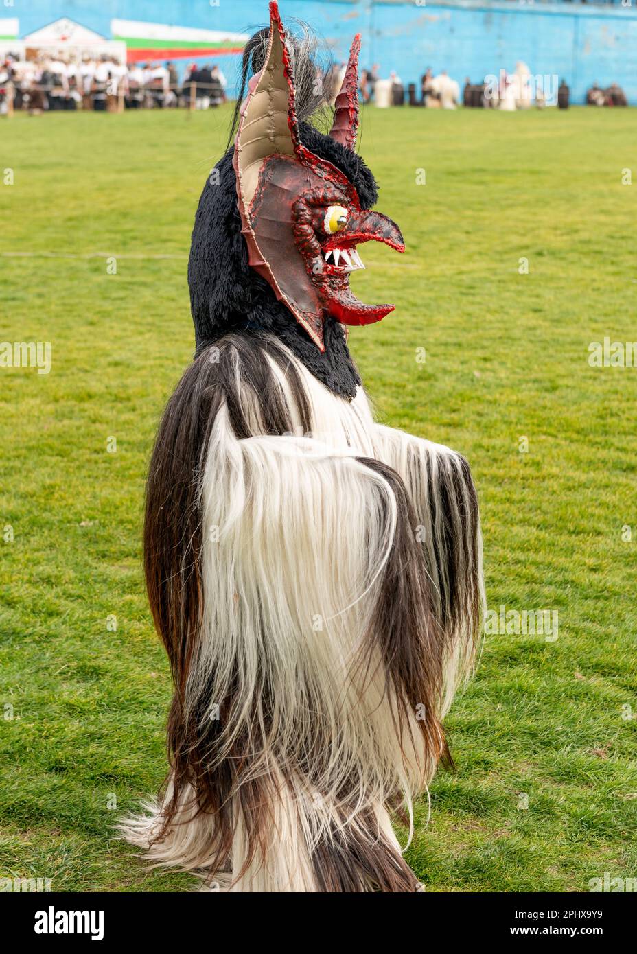 Cosplayer wearing odd mask depicting Devil and hairy animal costume at ...