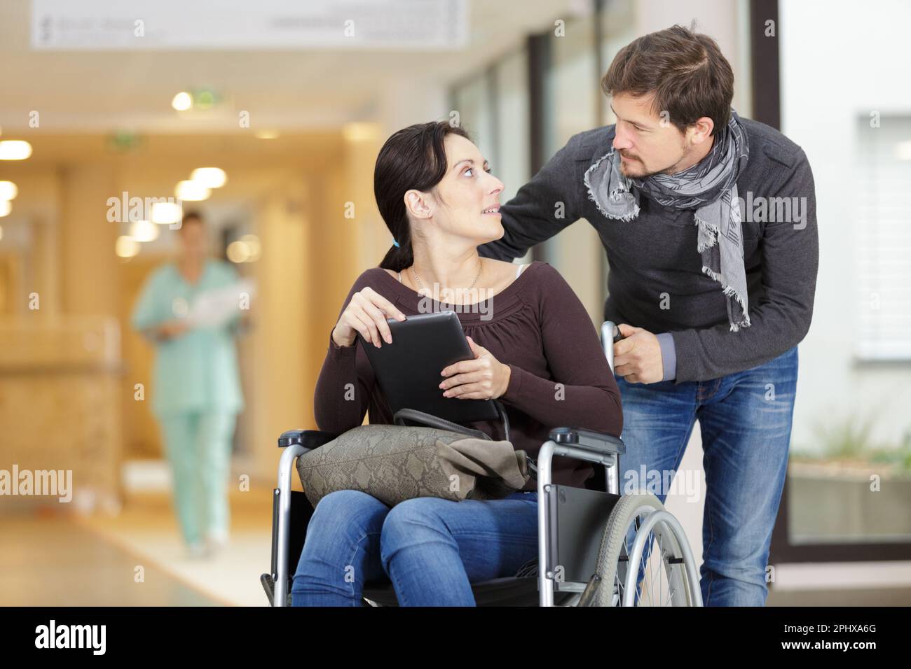 disabled patient on wheelchair after visiting doctor for regular check ...