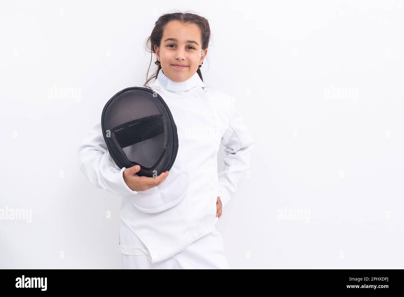 Little girl fencer with epee and mask Stock Photo - Alamy