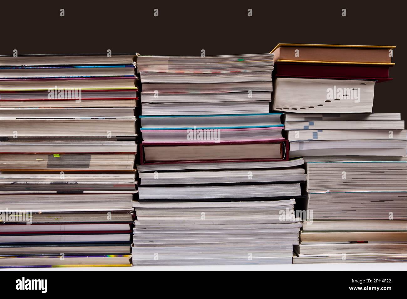 Several books are piled up. a pile of books. a bundle of books. books ...